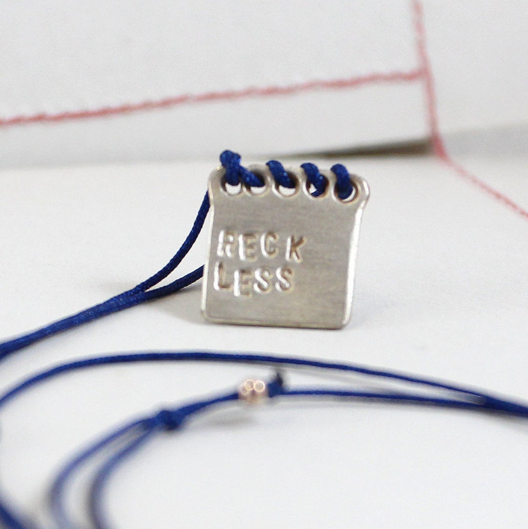 RECKLESS Silver Amulet - Etsy