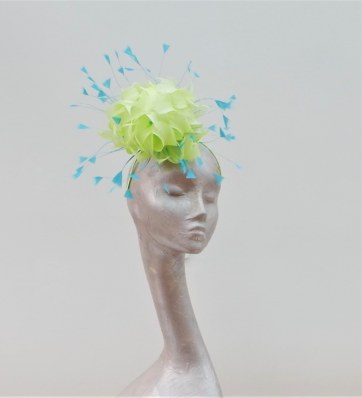 Beautiful feather fascinator in Lime Green & Turquoise