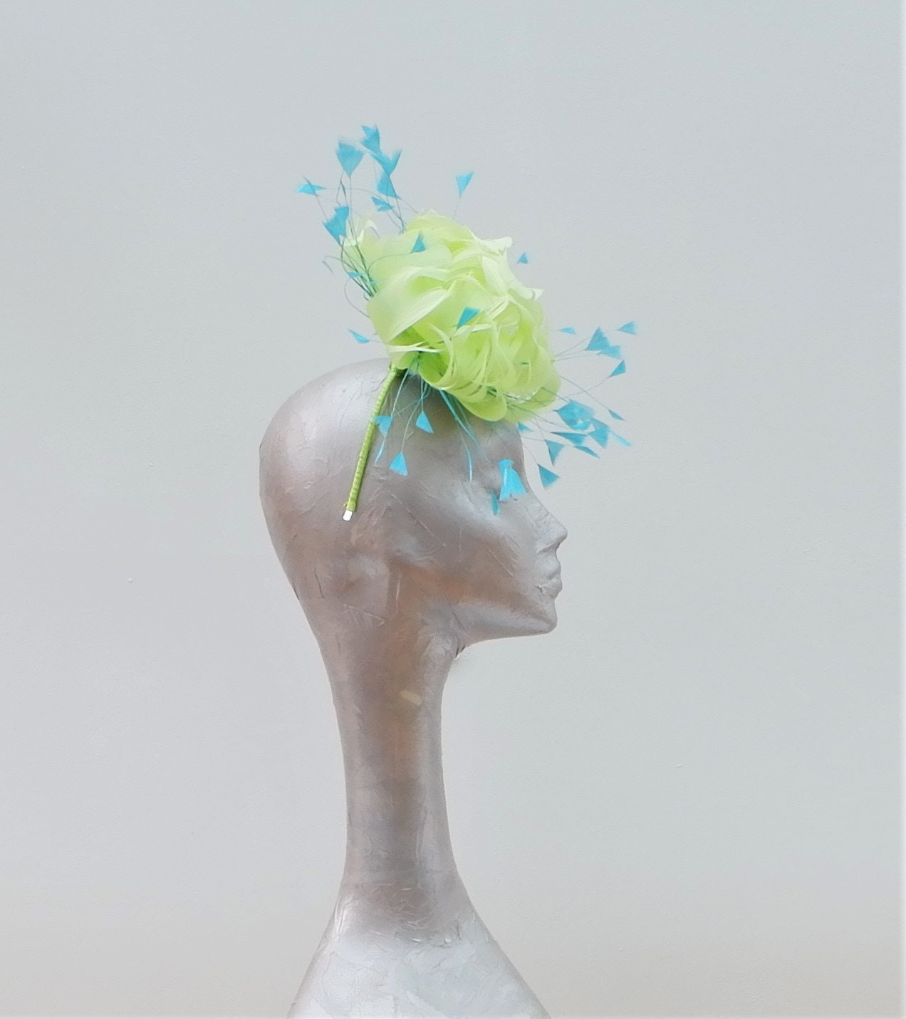 Beautiful feather fascinator in Lime Green & Turquoise