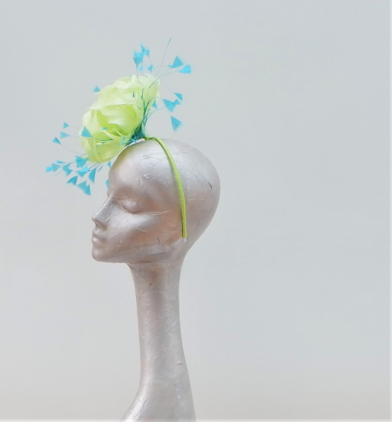 Beautiful feather fascinator in Lime Green & Turquoise