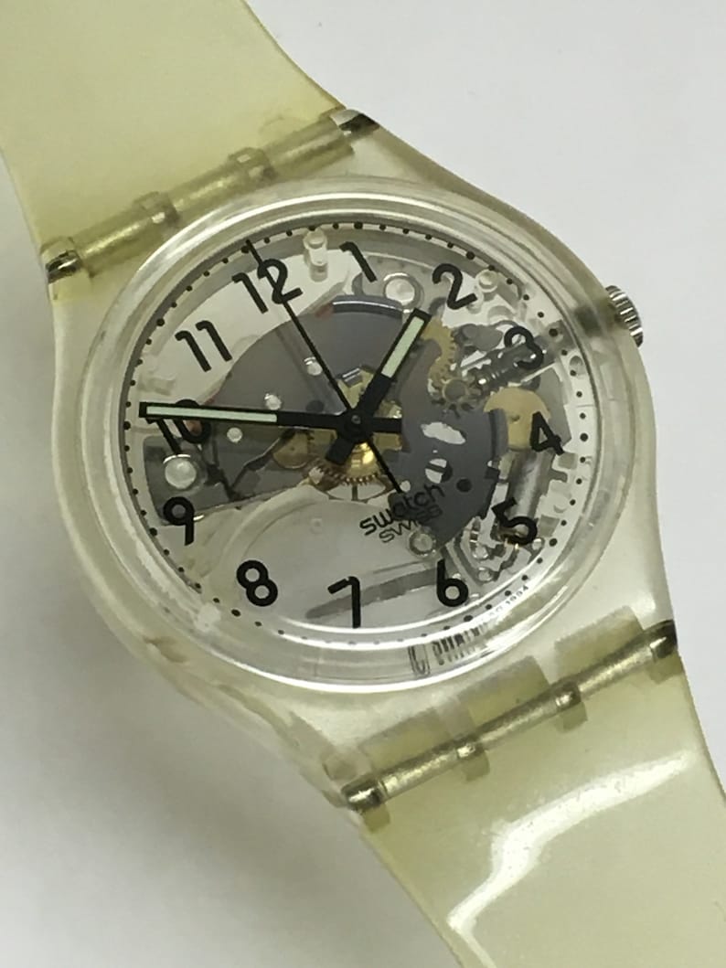 Clear swatch watch - batmancaddy