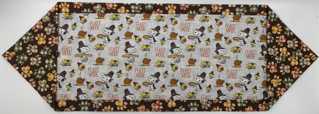 Peanuts- Snoopy and Woodstock Feast Mode Table Runner - Pawprint Border ...