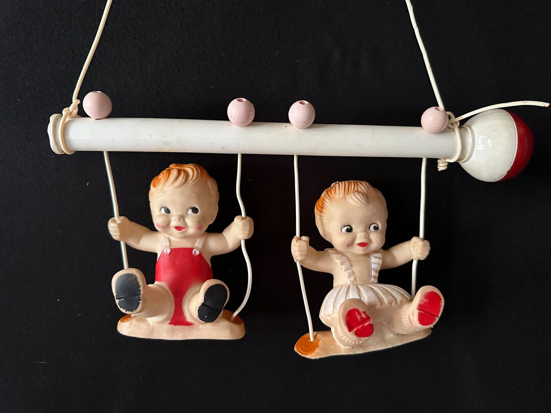 Vintage SQUEAKY TOYS - Boy and Girl Dolls Swinging - Etsy