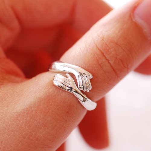 Sterling Silver or Gold Hand Hugging Ring Embrace Ring - Etsy