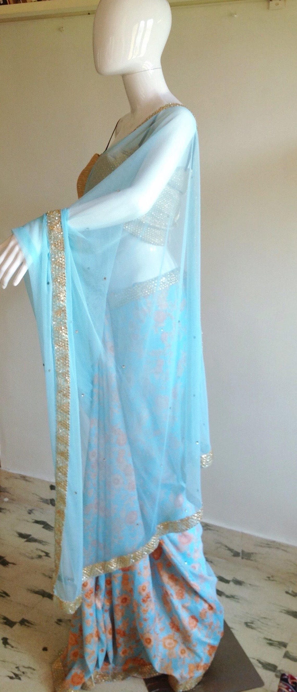 Soft Blue Net Saree With Stone Work and Gold Sequin Blouse - Etsy India