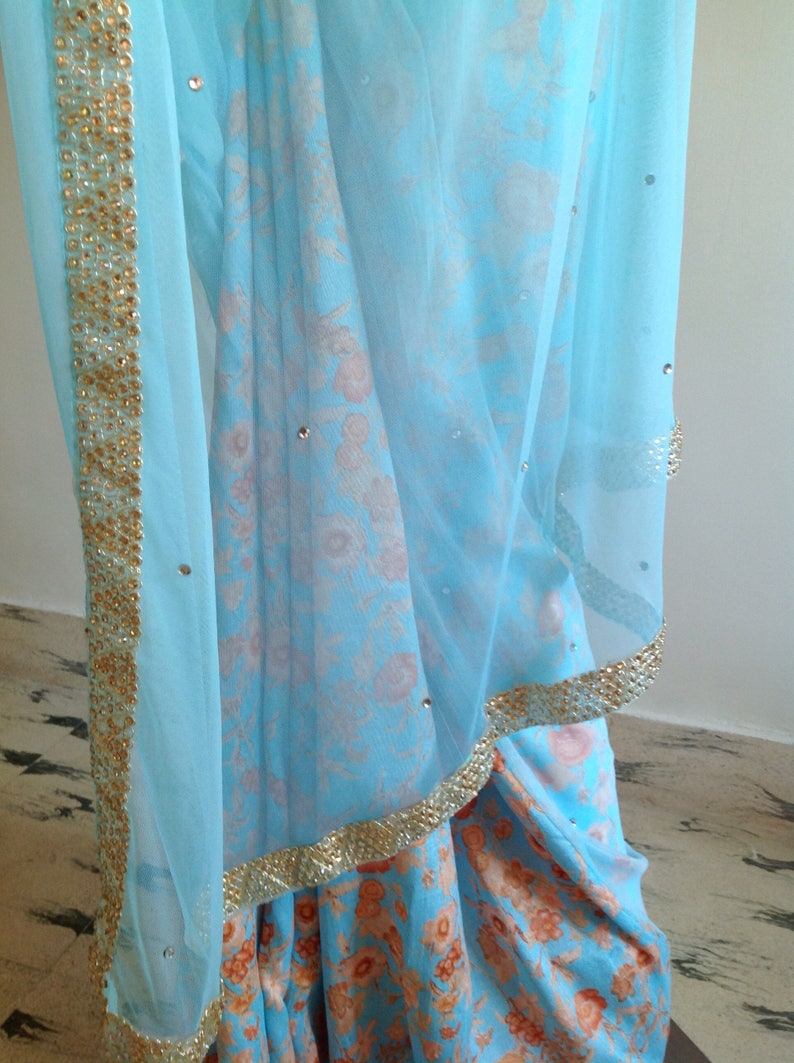 Soft Blue Net Saree With Stone Work and Gold Sequin Blouse - Etsy India