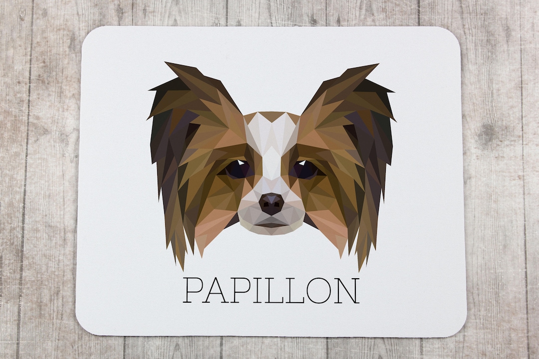 A Computer Mouse Pad With a Papillon Dog. A New Collection With the ...