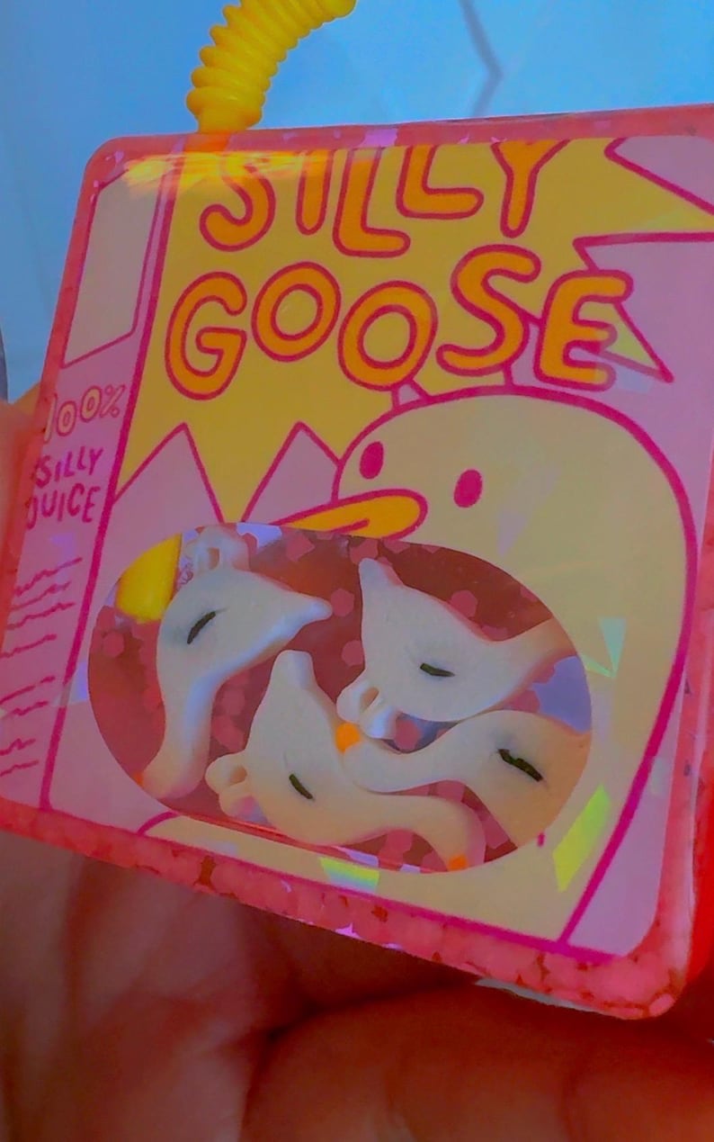 Silly Goose Juice-badgereel-sleutelhanger • Glow Goose-saphaspel ...