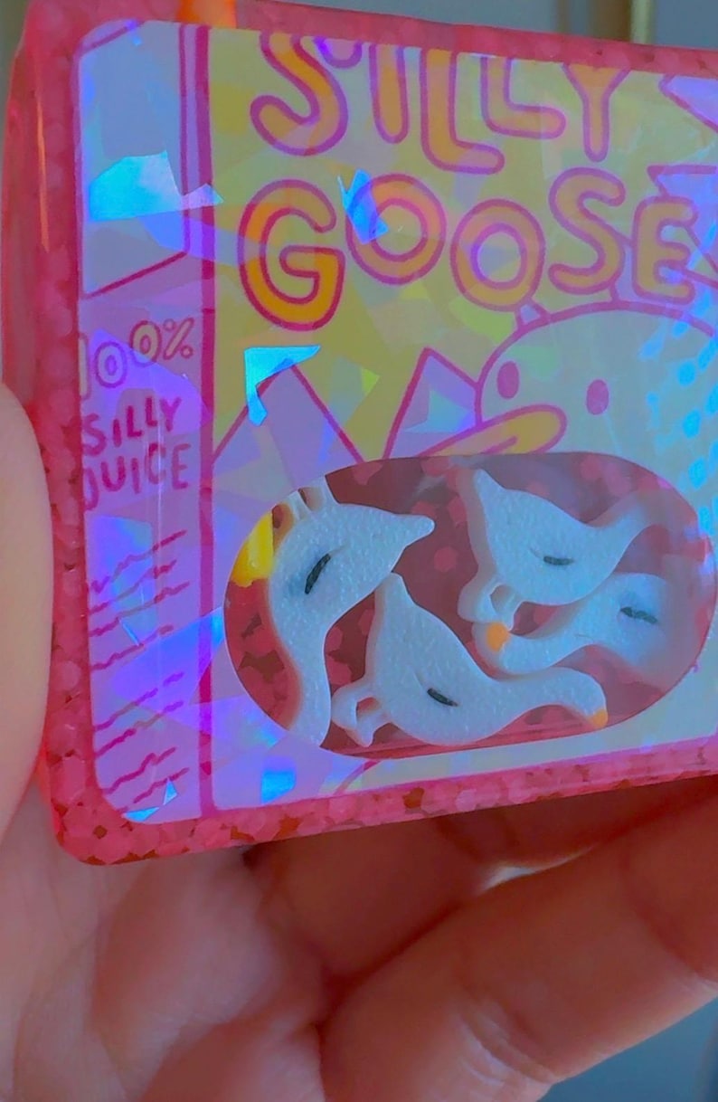 Silly Goose Juice-badgereel-sleutelhanger • Glow Goose-saphaspel ...