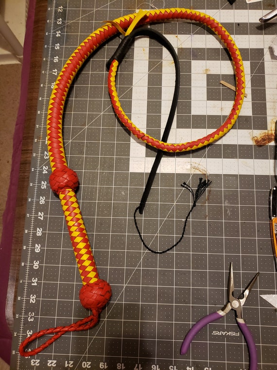 4 ft bullwhip with approx 2 ft cracker garnet and gold | Etsy