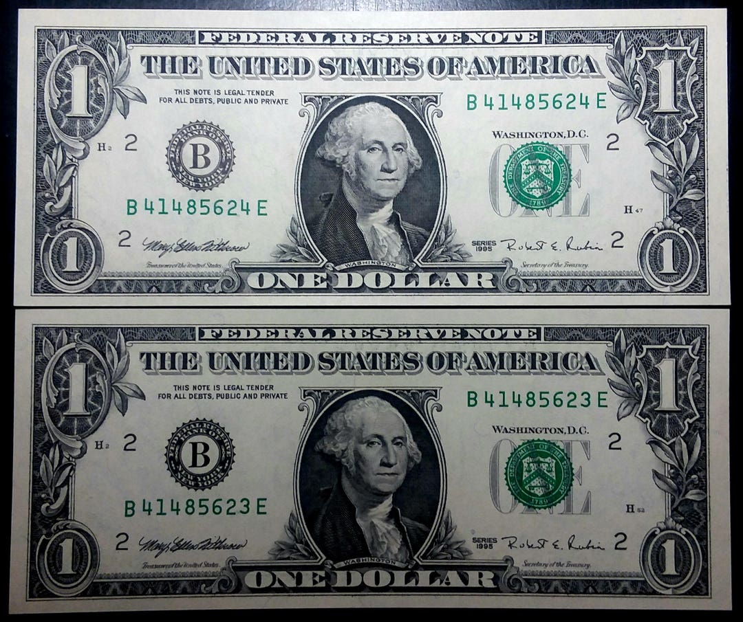 A Pair of 1995 Uncirculated Crisp Consecutive Numbered One Dollar Bills ...