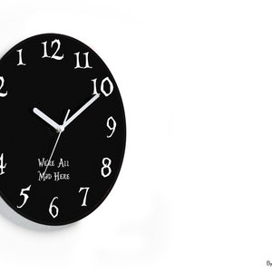 Reverse Wall Clock - Round Black Funny Clock - Backwards Running Time ...
