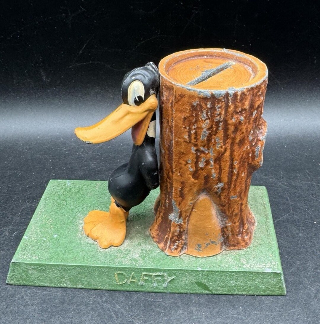 Rare Looney Tunes Daffy Duck Cast Iron Bank Warner Bros Nice! - Etsy