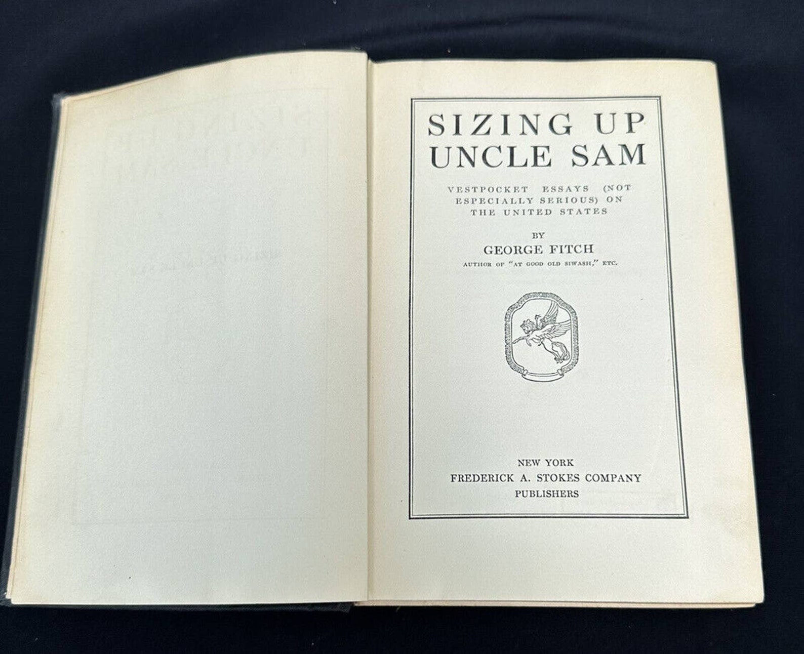 Sizing up Uncle Sam by George Fitch Frederick A. Stokes, 1914 ...