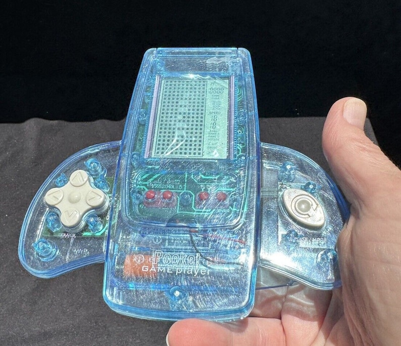 Vintage Pocket Clear Blue Rocket Electronic Handheld LCD Brick Game ...