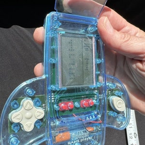 Vintage Pocket Clear Blue Rocket Electronic Handheld LCD Brick Game ...