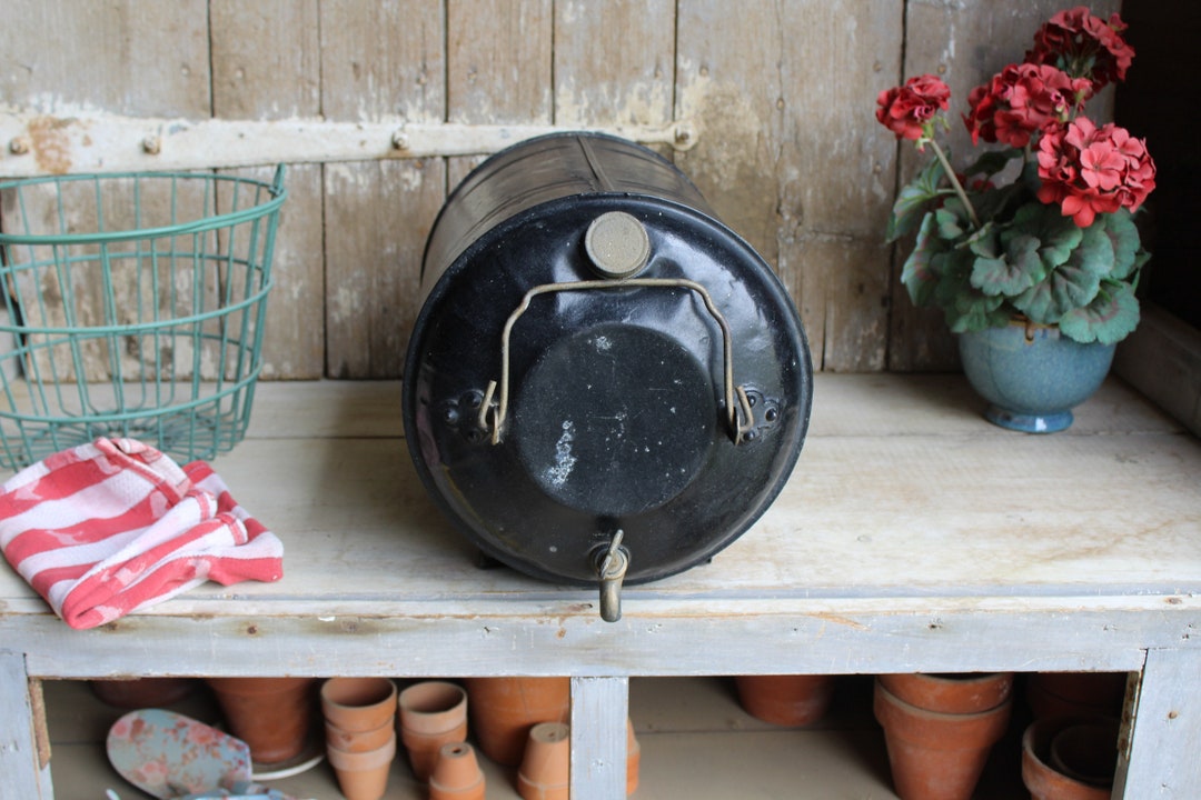 Antique Large Black Metal Oil Can With Brass Spigot on Top, Lays Down ...