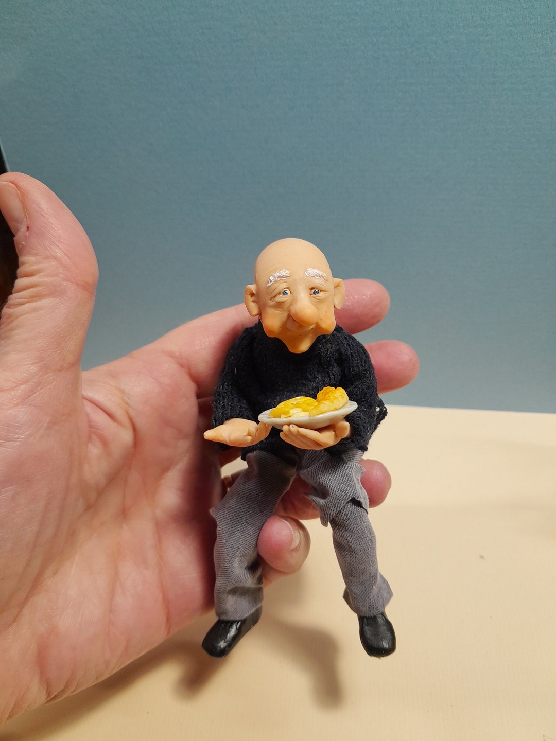 Seated Fred is Excited He's Got a Plate of Fish and Chips Hand Sculpted ...