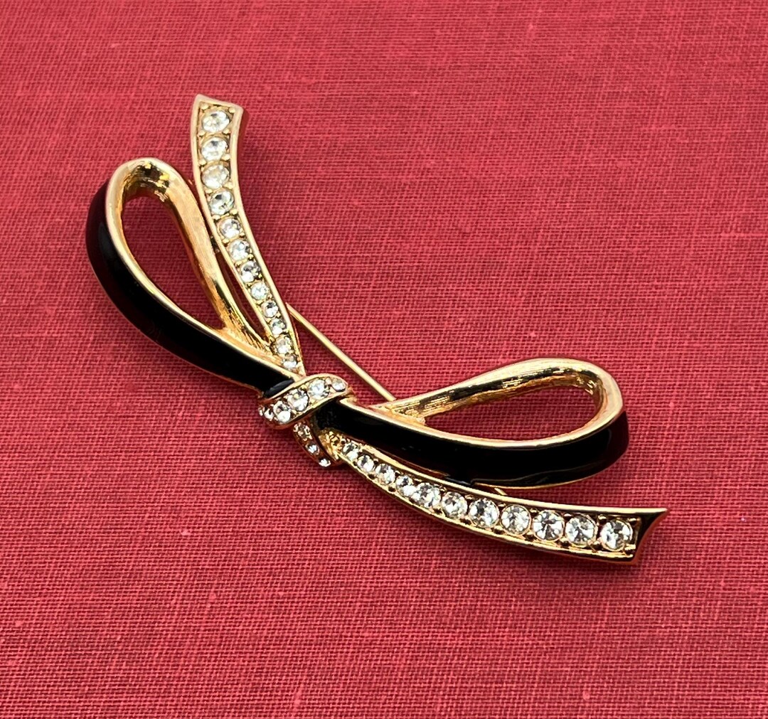 RHINESTONE BOW PIN Loosely Tied Goldtone Black Enamel Brooch Ribbon ...