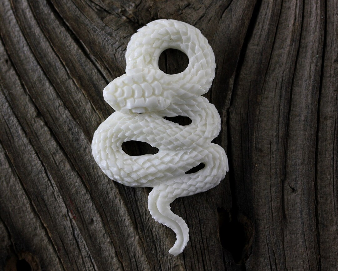 Snake Carving From Bone Primordial Life Force Mythological Symbol ...