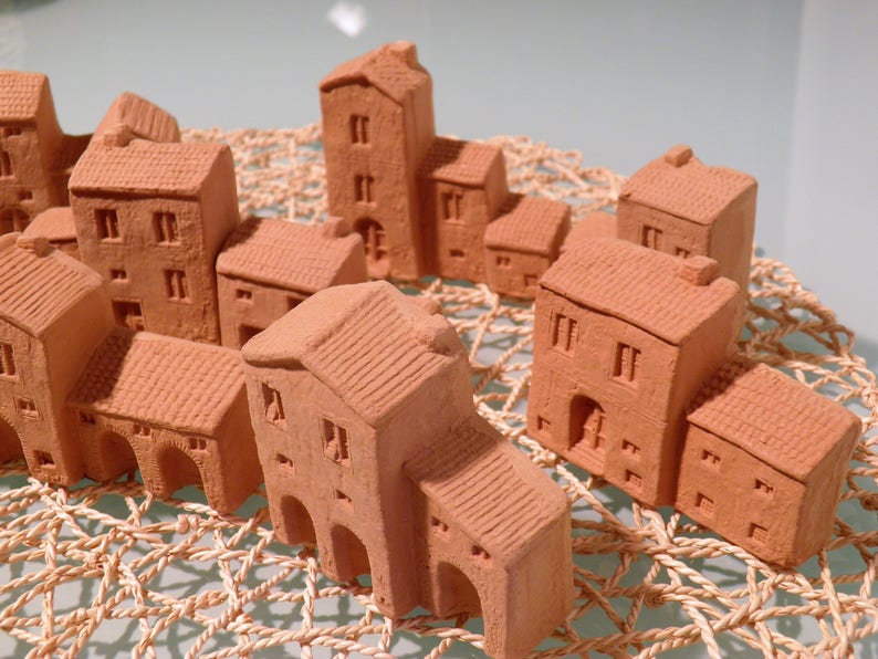 Group of 10 Terracotta Houses That Form a Small Village. They Can Also ...