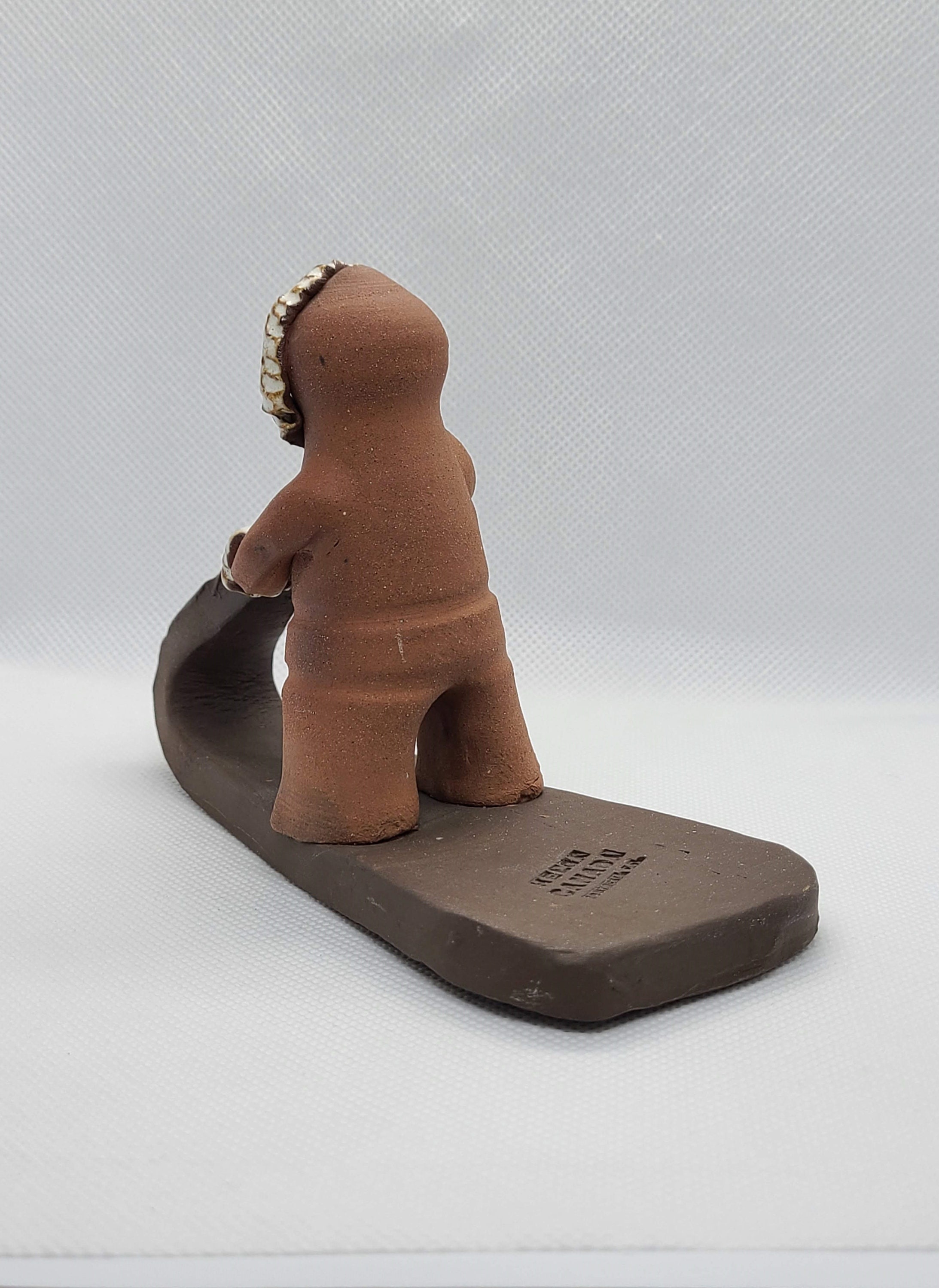 Vintage Canadian Red Clay Pottery Figurine of an Inuit Man on Sled by ...