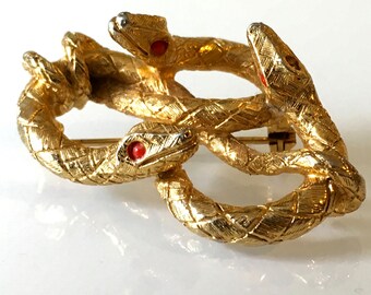 Intertwined snakes | Etsy