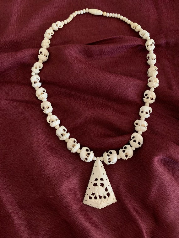 vintage bone carved elephant - Gem