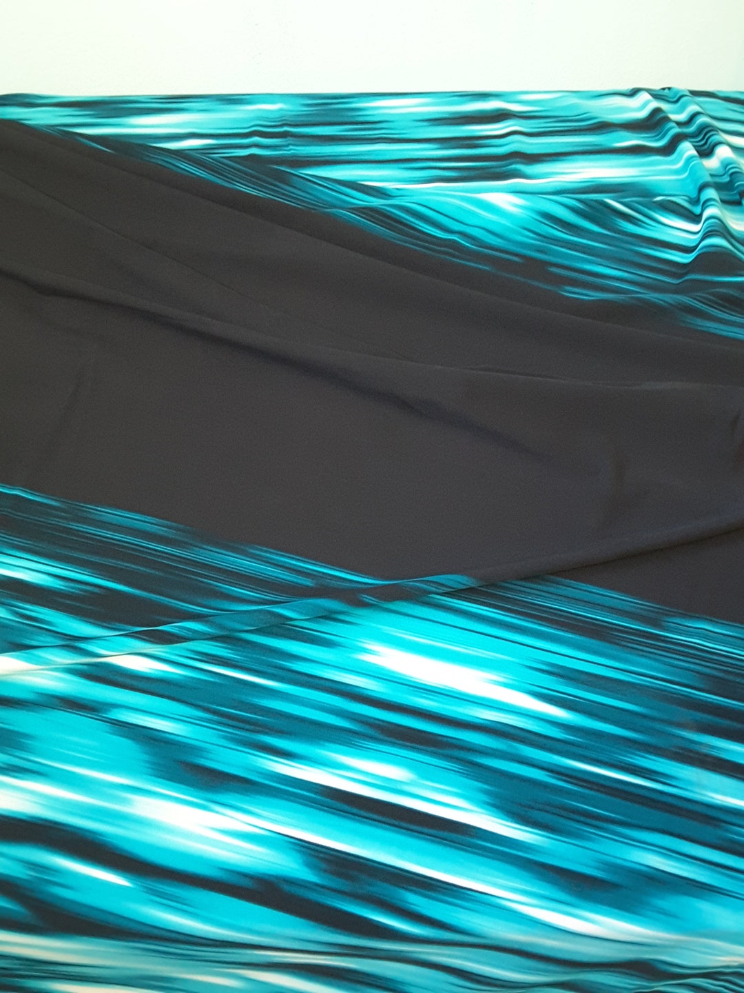 Border Teal Static Line to Black 4 Way Stretch Spandex Fabric by the ...