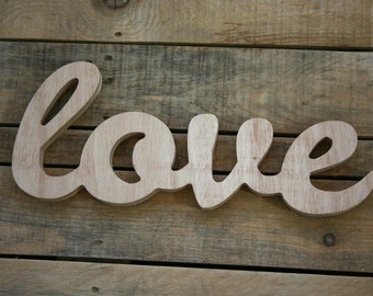 Cursive love sign | Etsy