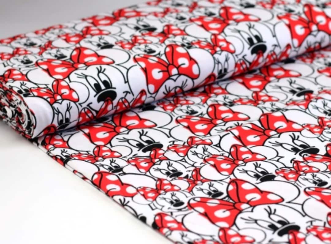 Katoenen jersey Minnie Mouse gezichten gelicentieerde stof vanaf 0,5 m ...