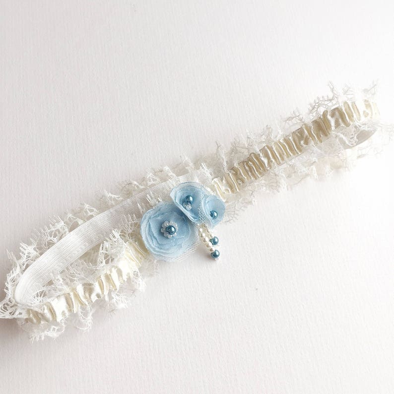 Brides wedding garter UK with Something Blue fabric flowers | Etsy