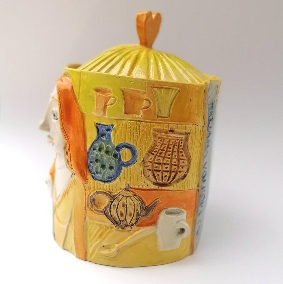 Handmade Pottery Jar With Sculpted Figures Decoration. Mother and ...