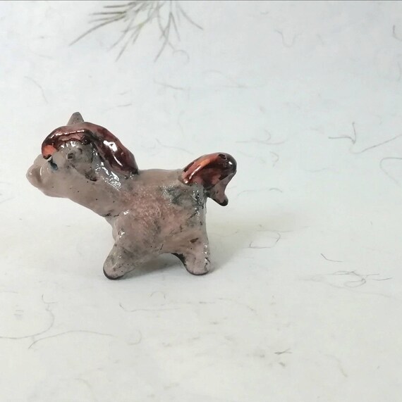 Raku. Not a toy Weird pink with very very shiny well looked after mane ...