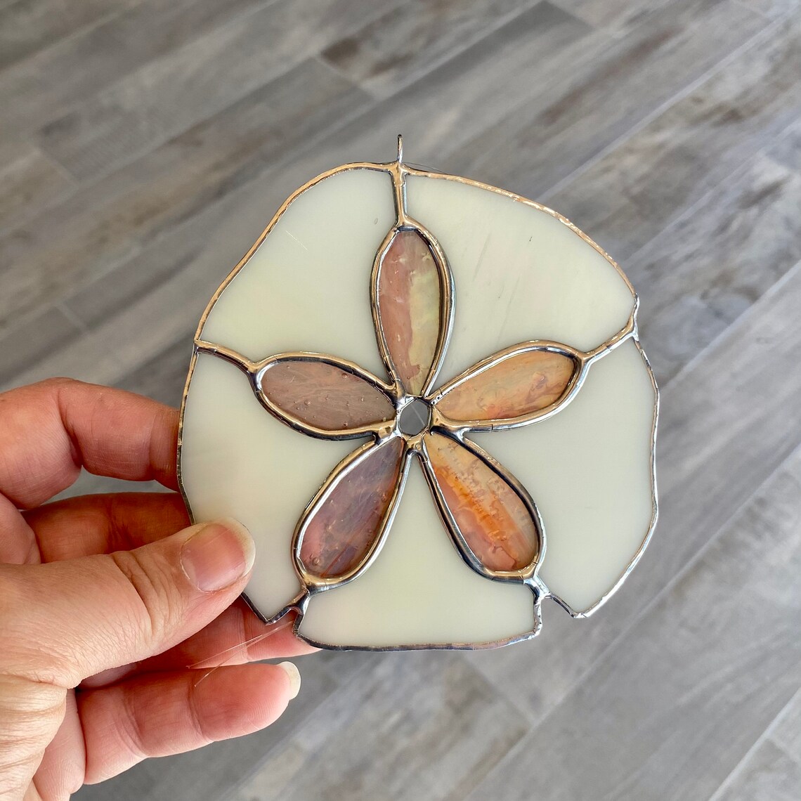 Handcrafted stained glass sand dollar in ivory and flamingo | Etsy