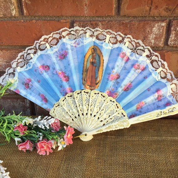 Hand Fan light blue plastic lattice work souvenir fan… - Gem