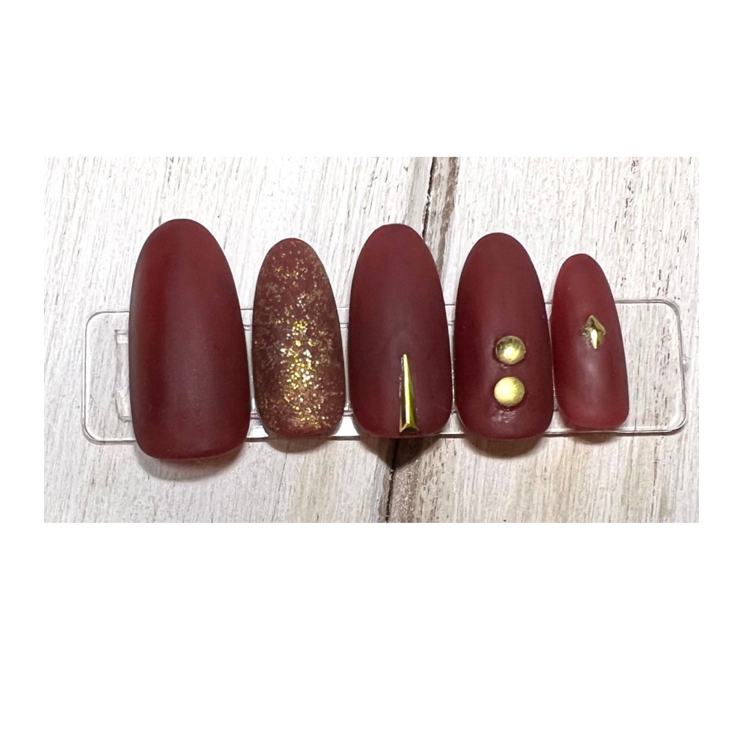 Maroon And Gold Nails