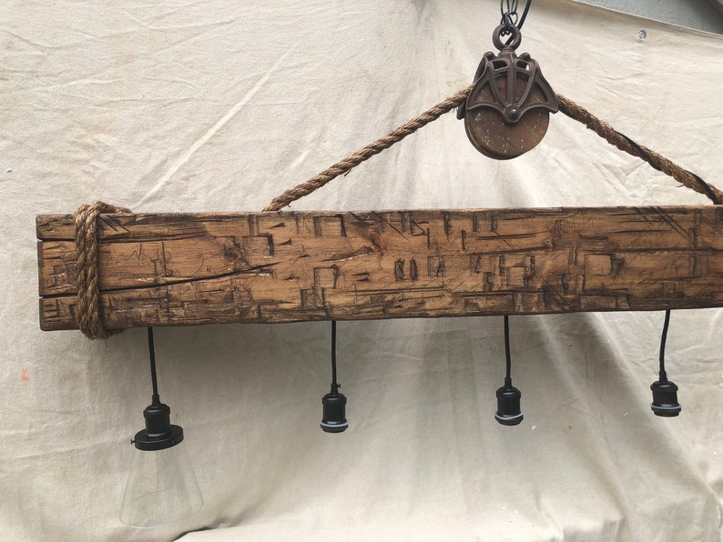 Rustic Barn Beam With Glass Lamp Shades. - Etsy