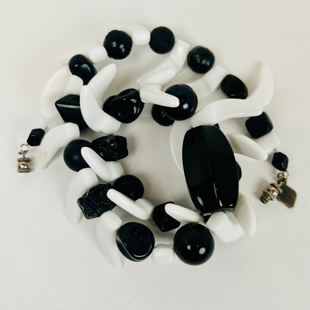 WHITE TEETH White Pressed Glass Teeth Alternate Between Vintage Black ...