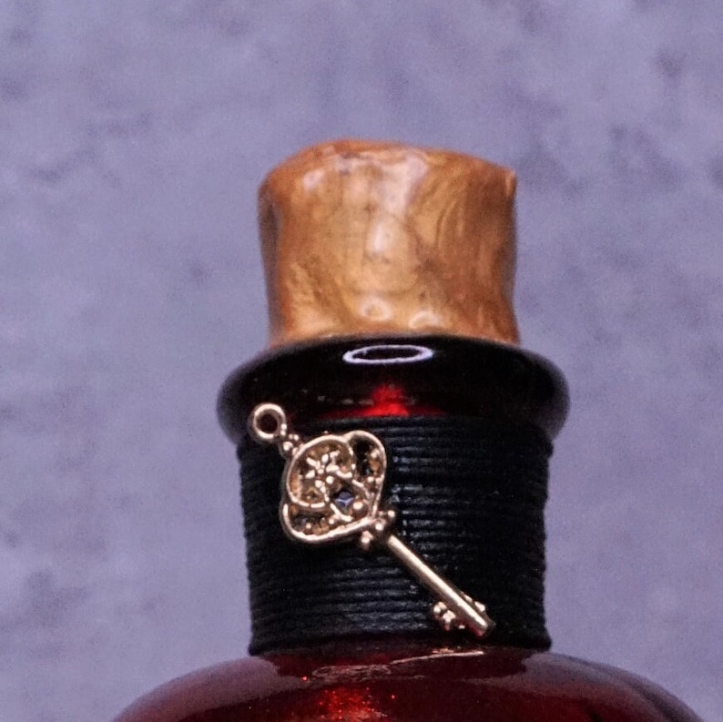 Alice in Wonderland Eat Me Potion Bottle | Etsy