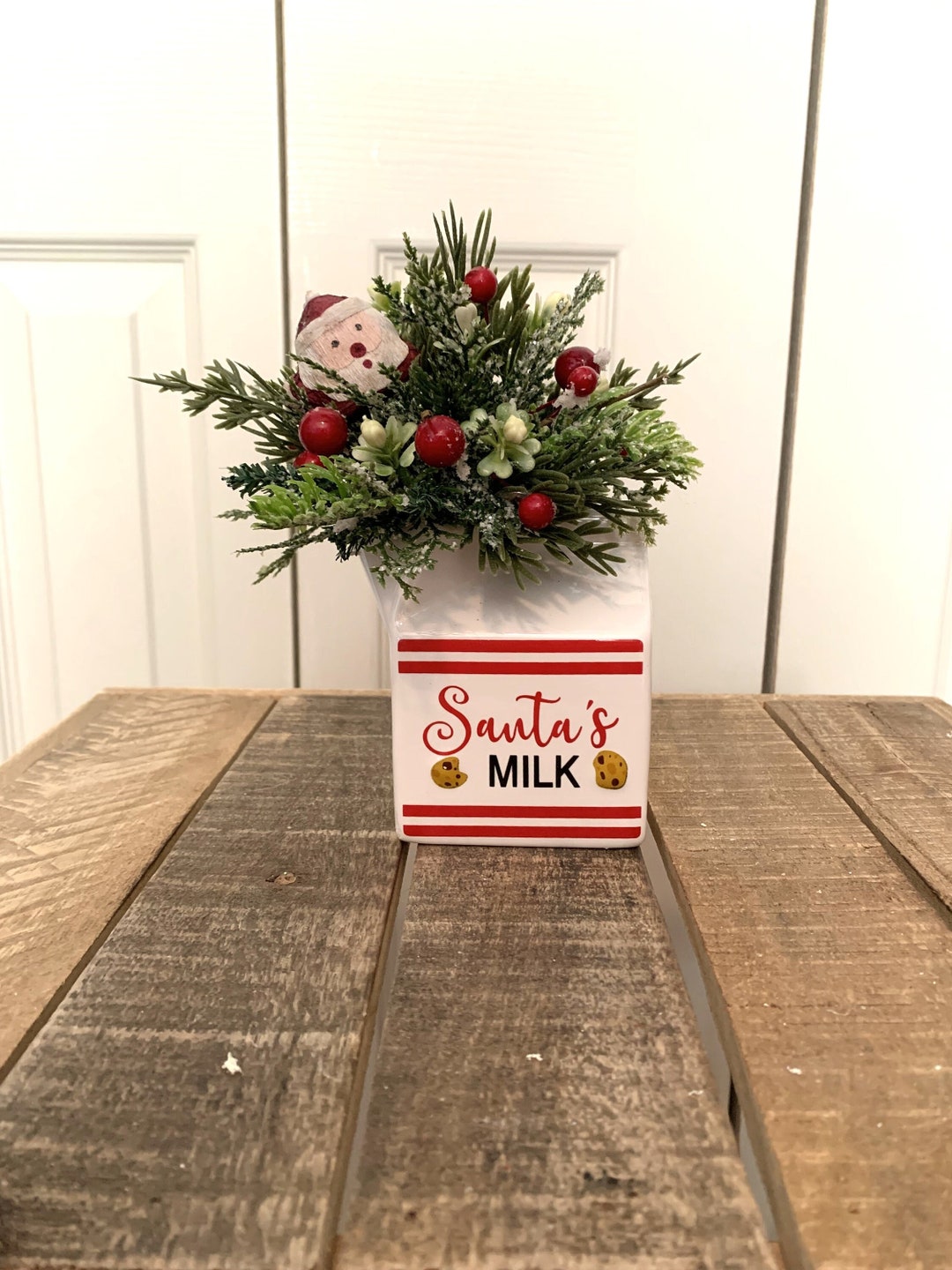 Small Pine Floral Arrangement With Primitive Santa - Santa's Milk ...