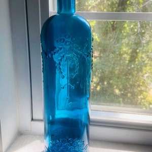 VINTAGE Blue Glass Bottle, Embossed Glass, Aqua Blue, Rose Basket ...
