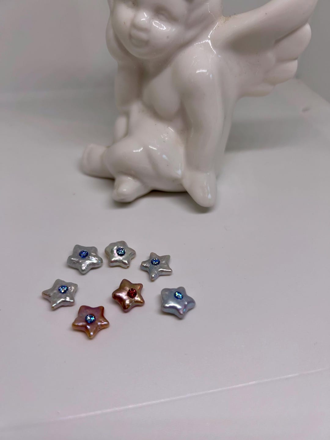 Beautiful Pearl Stars With Real Lab Made Diamonds. Each Star Has a 0.1 ...