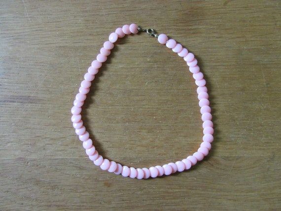1960s baby pink plastic small flat disc collar length… - Gem