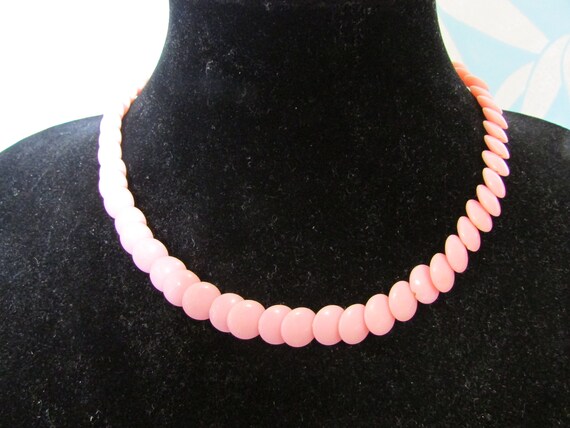 1960s baby pink plastic small flat disc collar length… - Gem