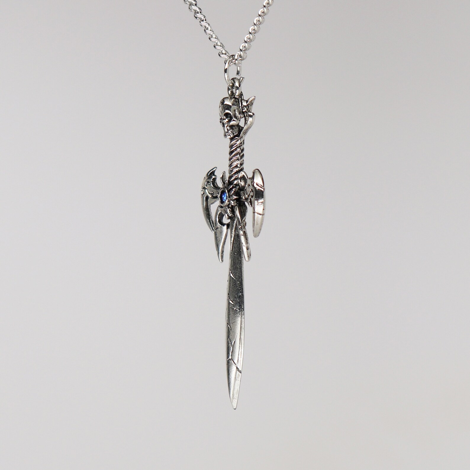 Etched Sword and Skull With Blue Crystal Silver Finish Pewter Pendant ...