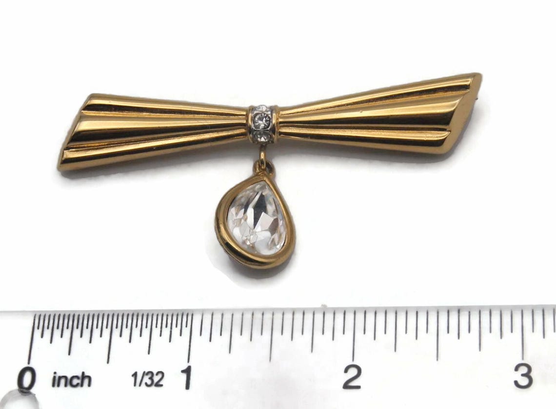Monet Gold Tone and Clear Rhinestones Bar Brooch With Dangle. Monet ...