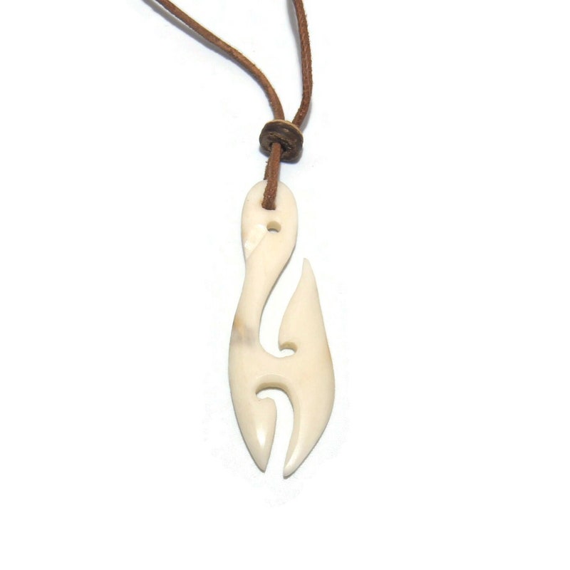Carved Bone Pendant - Etsy