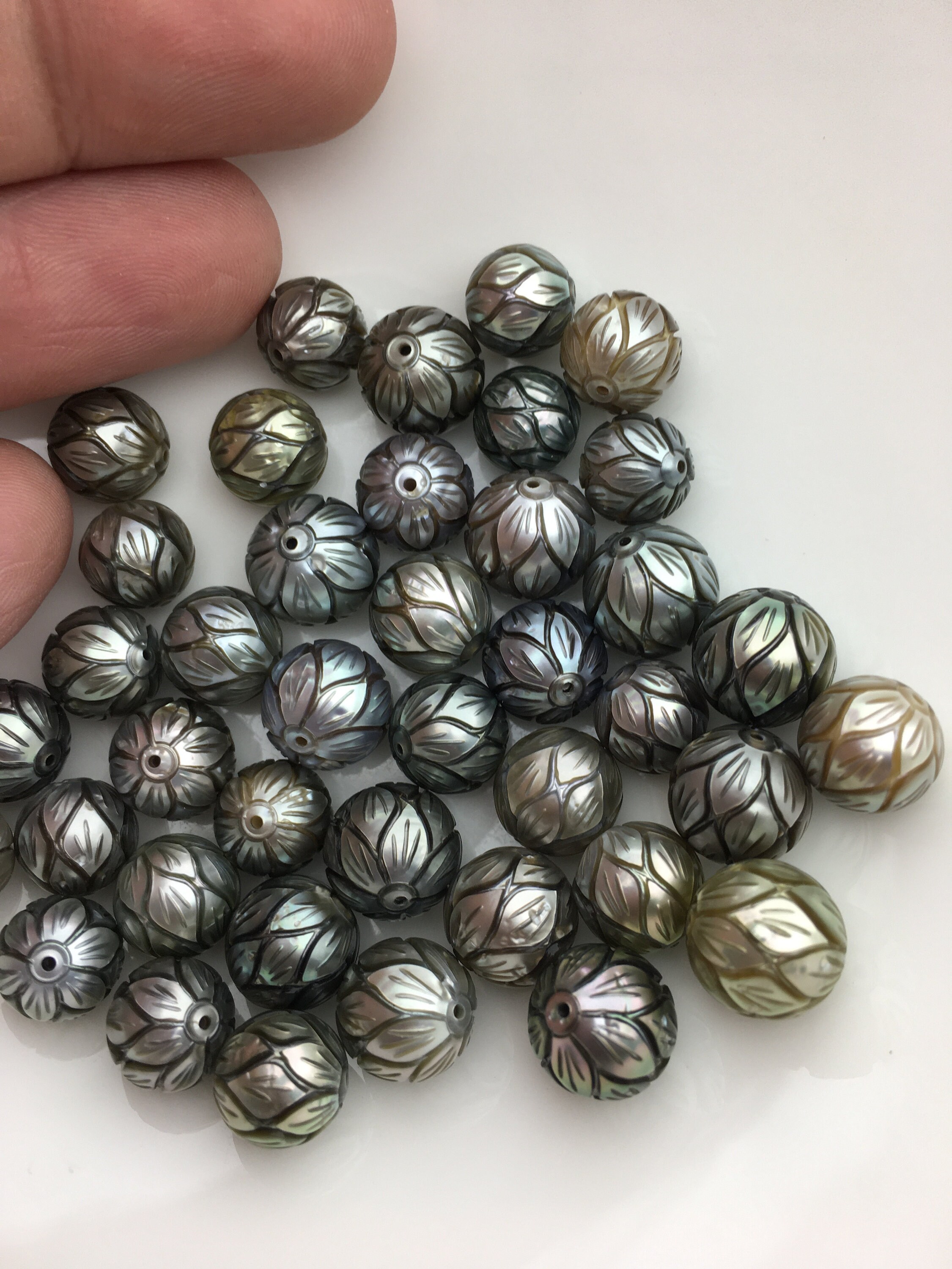 Hand Carved Tahitian Pearls