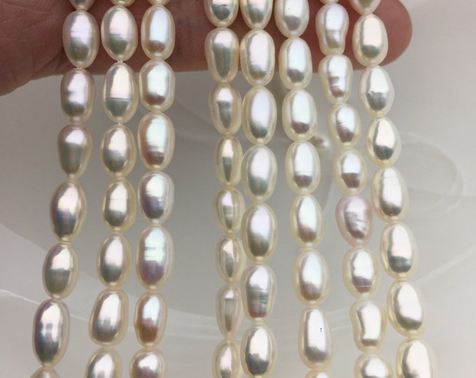 AA 5-5.5mm7-8.5mm Ivory Rainbow Long Rice Freshwater Pearls,freshwater ...